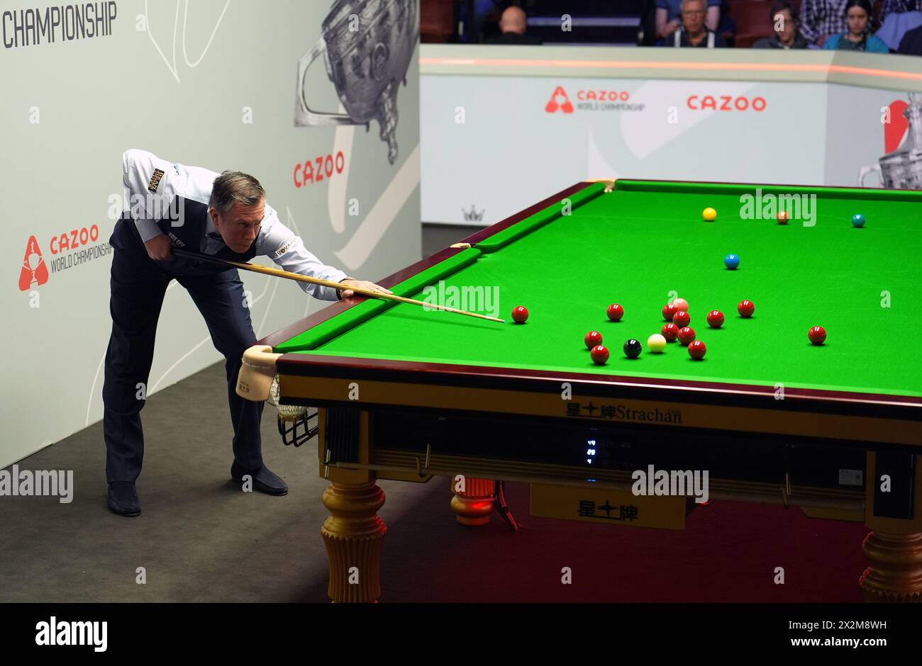 Dominic Dale in action against Kyren Wilson (not pictured) on day four ...