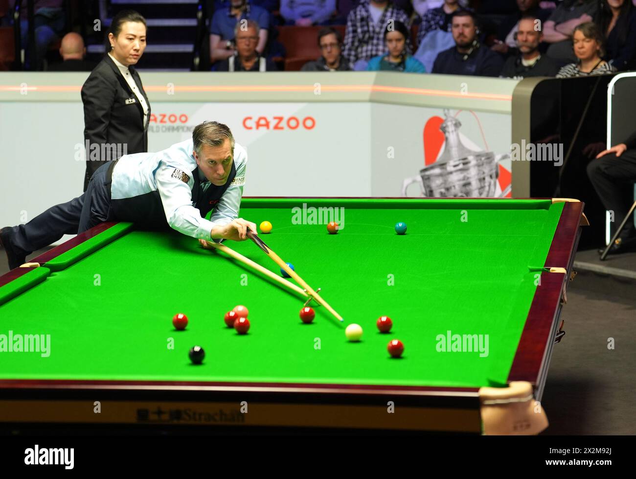 Dominic Dale in action against Kyren Wilson (not pictured) on day four ...