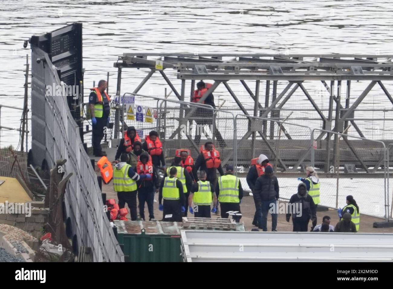 A group of people thought to be migrants are brought in to Dover, Kent ...
