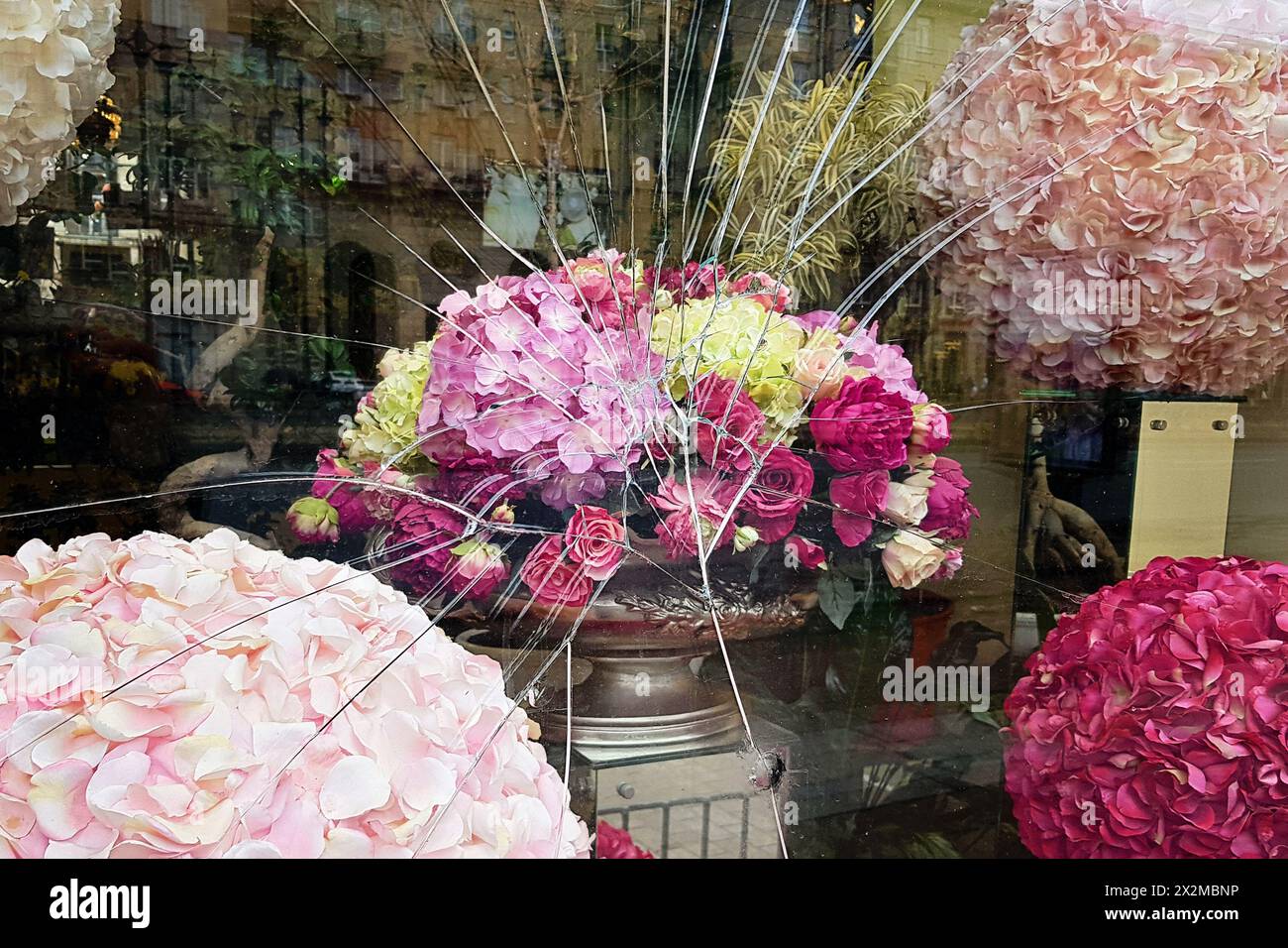 Broken glass in store window. Vandalism, destruction and insurance ...