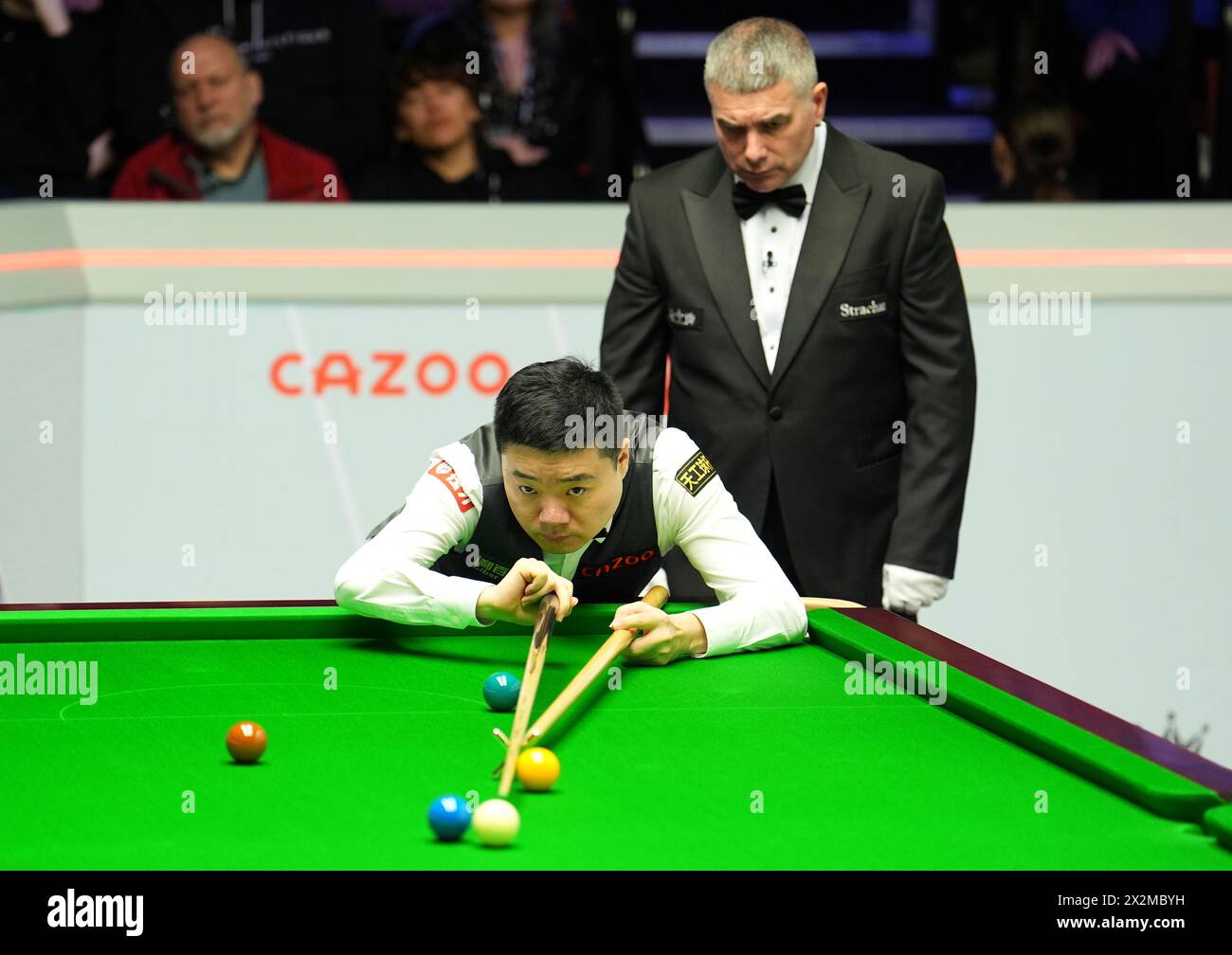 Ding Junhui in action against Jack Lisowski (not pictured) on day four ...