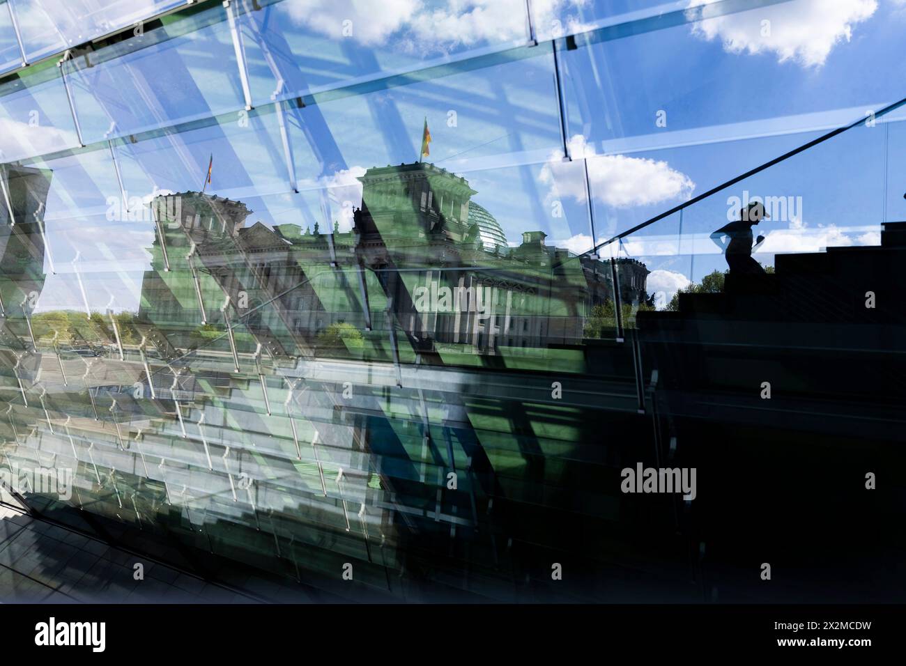 The Reichstag building is reflected in the windows of the Marie ...