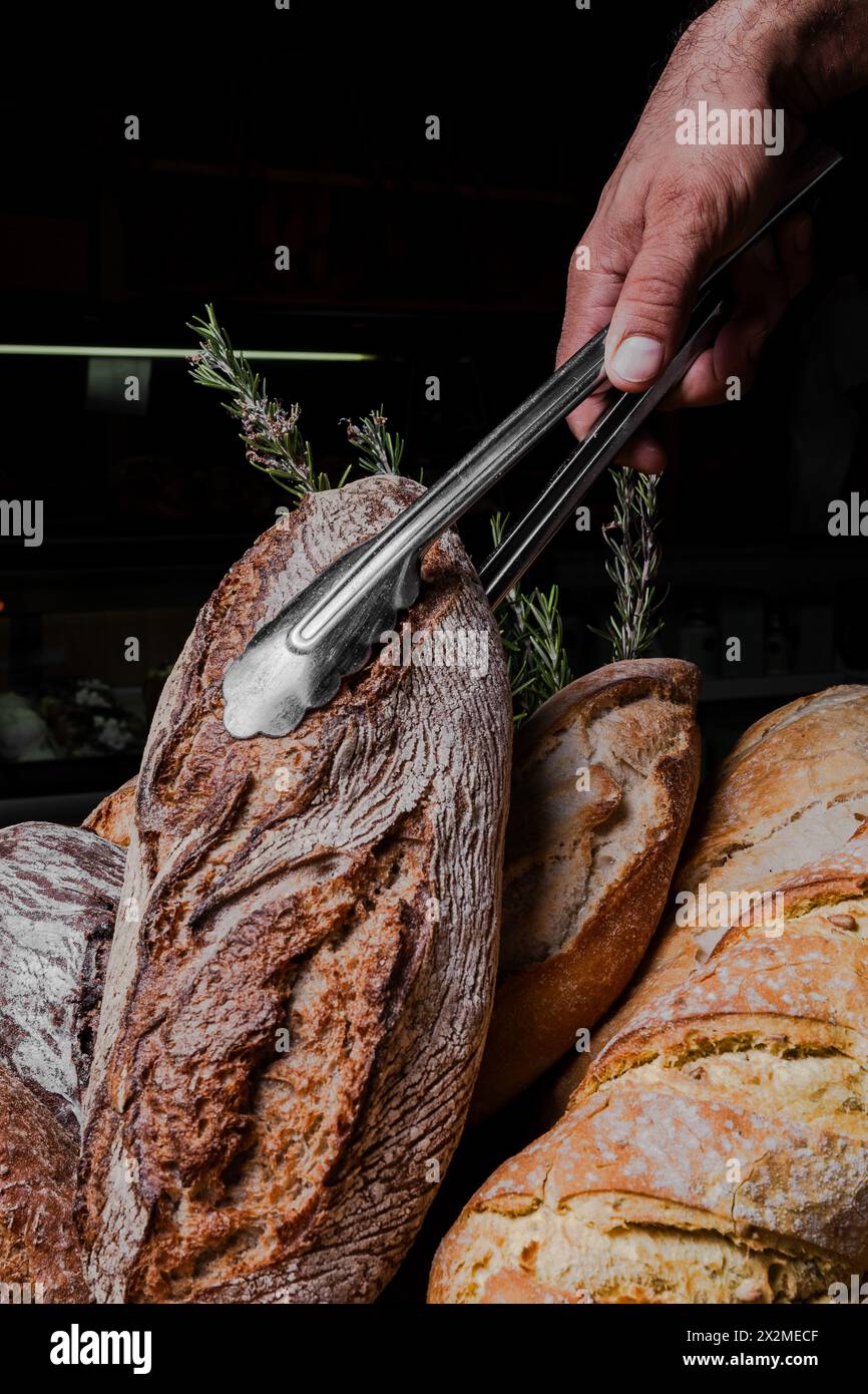 A variety of freshly baked sourdough breads with a crisp crust ...