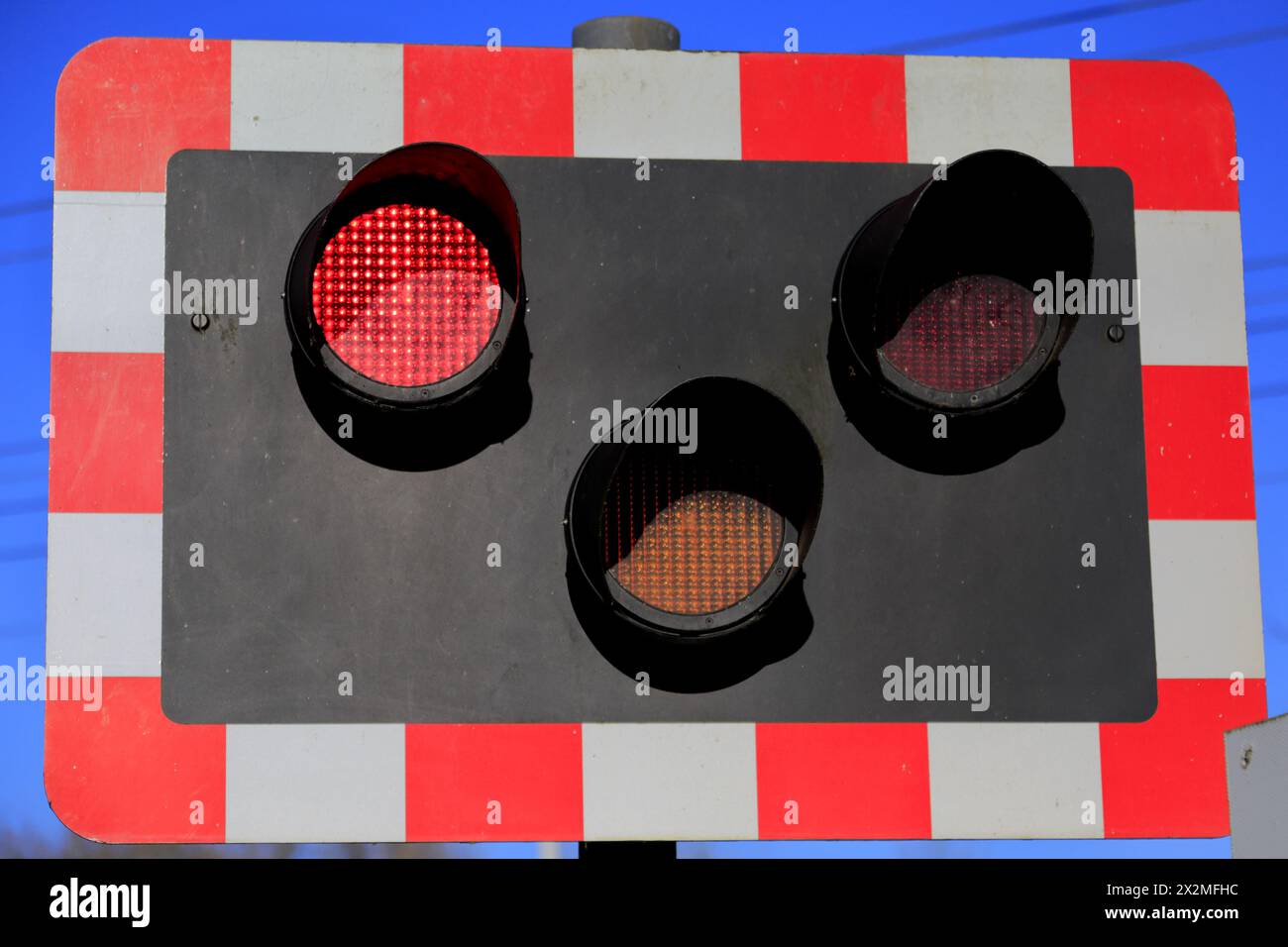 Warning red lights at an unmanned Level crossing, East Coast Main Line ...