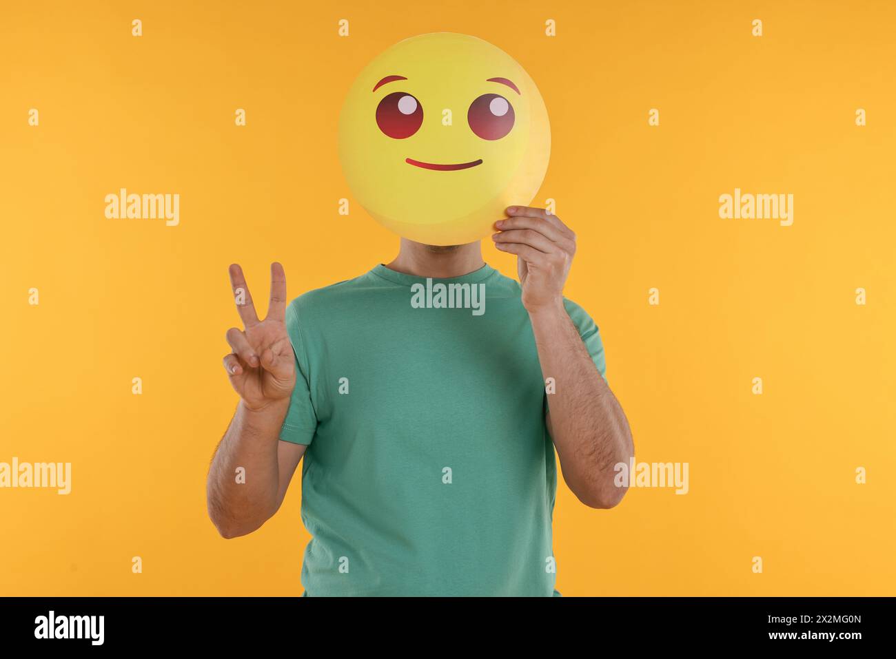 Smiley smiling happy emoticon yellow face hi-res stock photography and ...