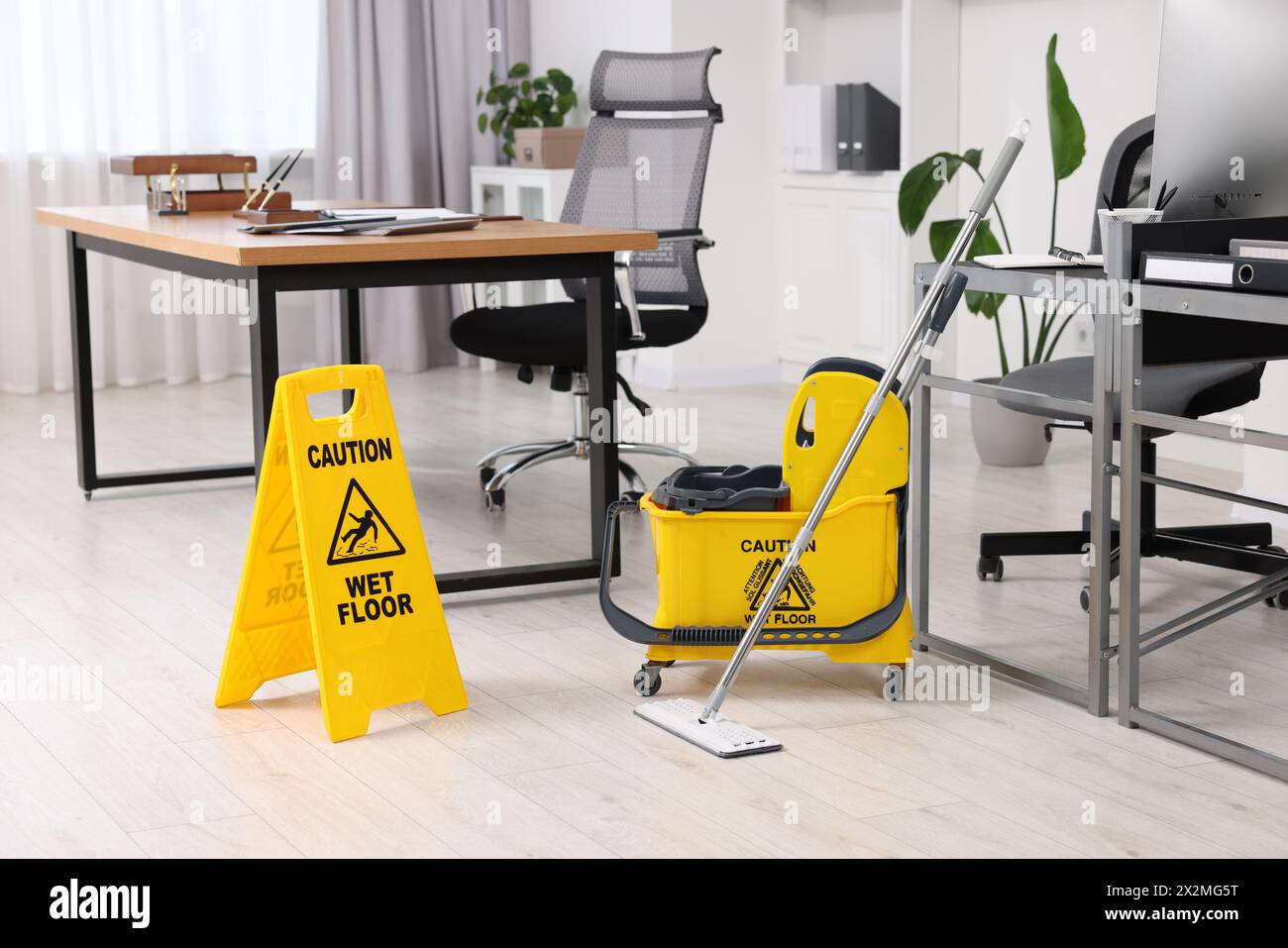 Mop bucket sign hi-res stock photography and images - Alamy