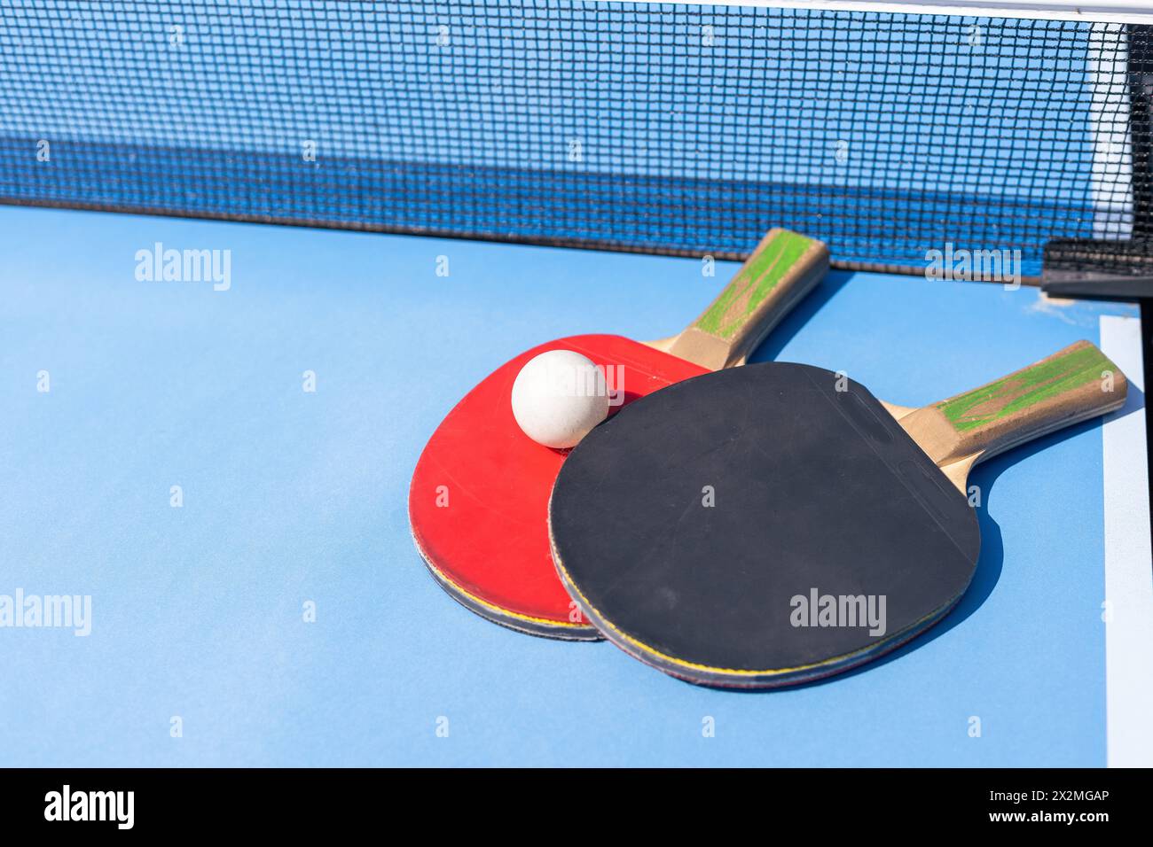 table tennis ball and paddle Stock Photo - Alamy