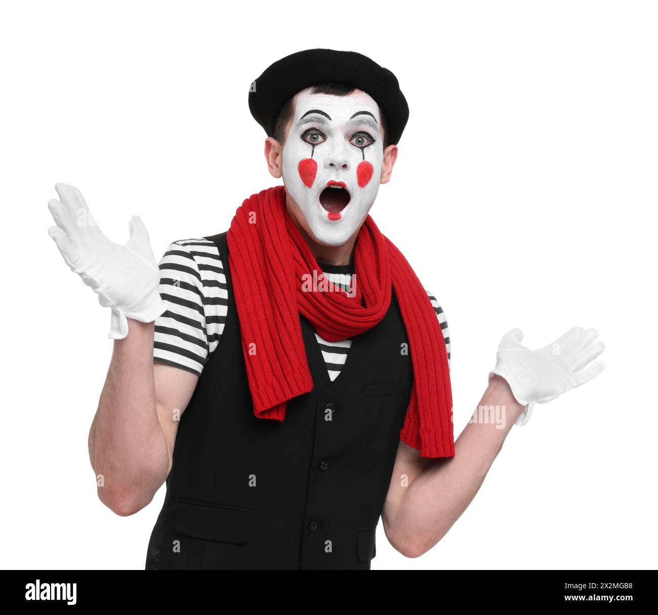 Mime artist making shocked face on white background Stock Photo - Alamy