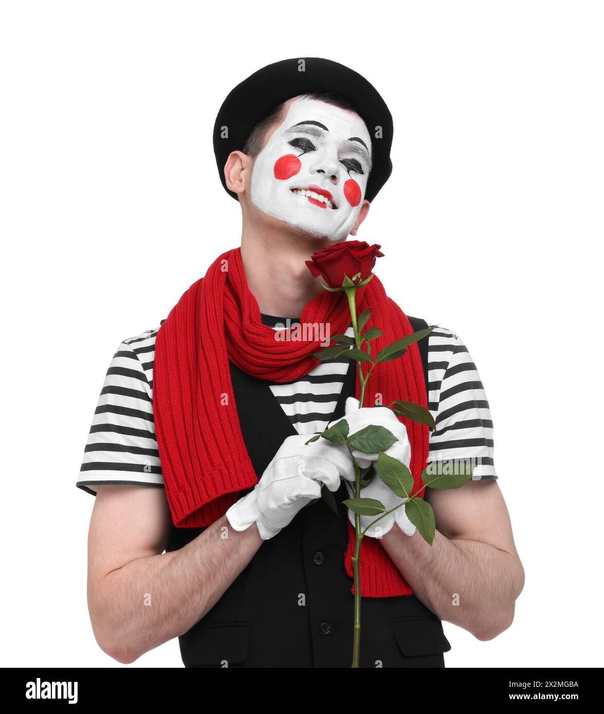 Funny mime artist with red rose on white background Stock Photo - Alamy