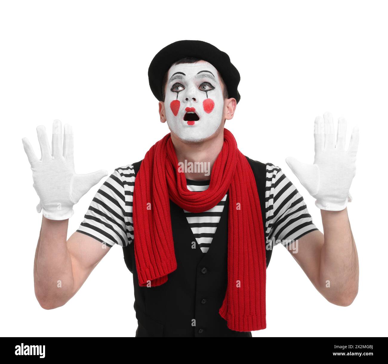 Mime artist making shocked face on white background Stock Photo - Alamy