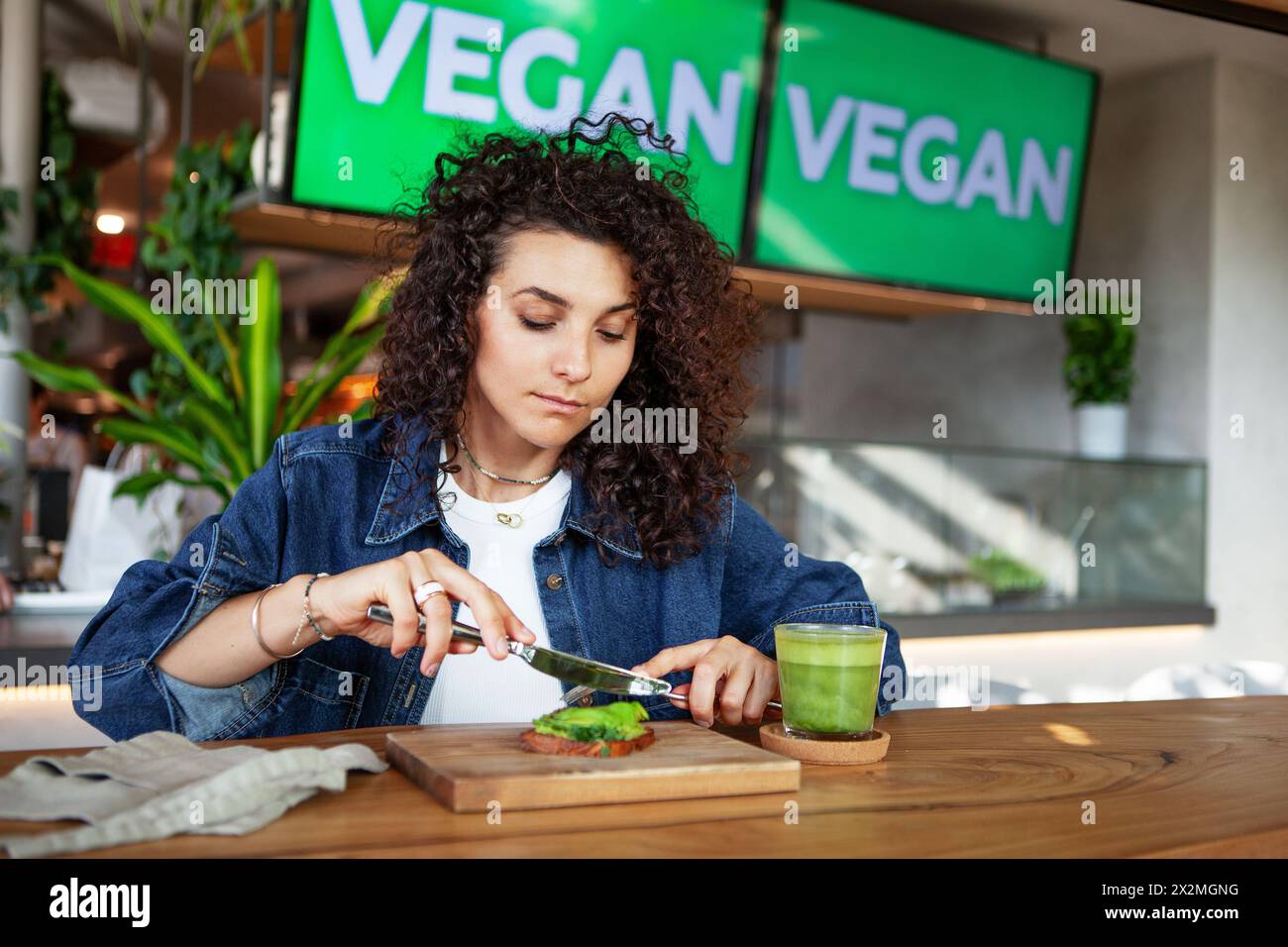 Eating vegan cafe sign hi-res stock photography and images - Alamy