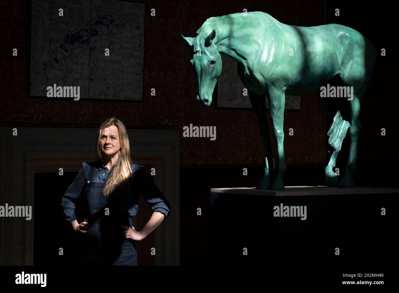 Artist Frippy Jameson alongside her bronze equine sculpture titled ...