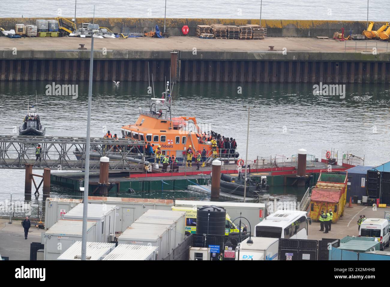 A group of people thought to be migrants are brought in to Dover, Kent ...