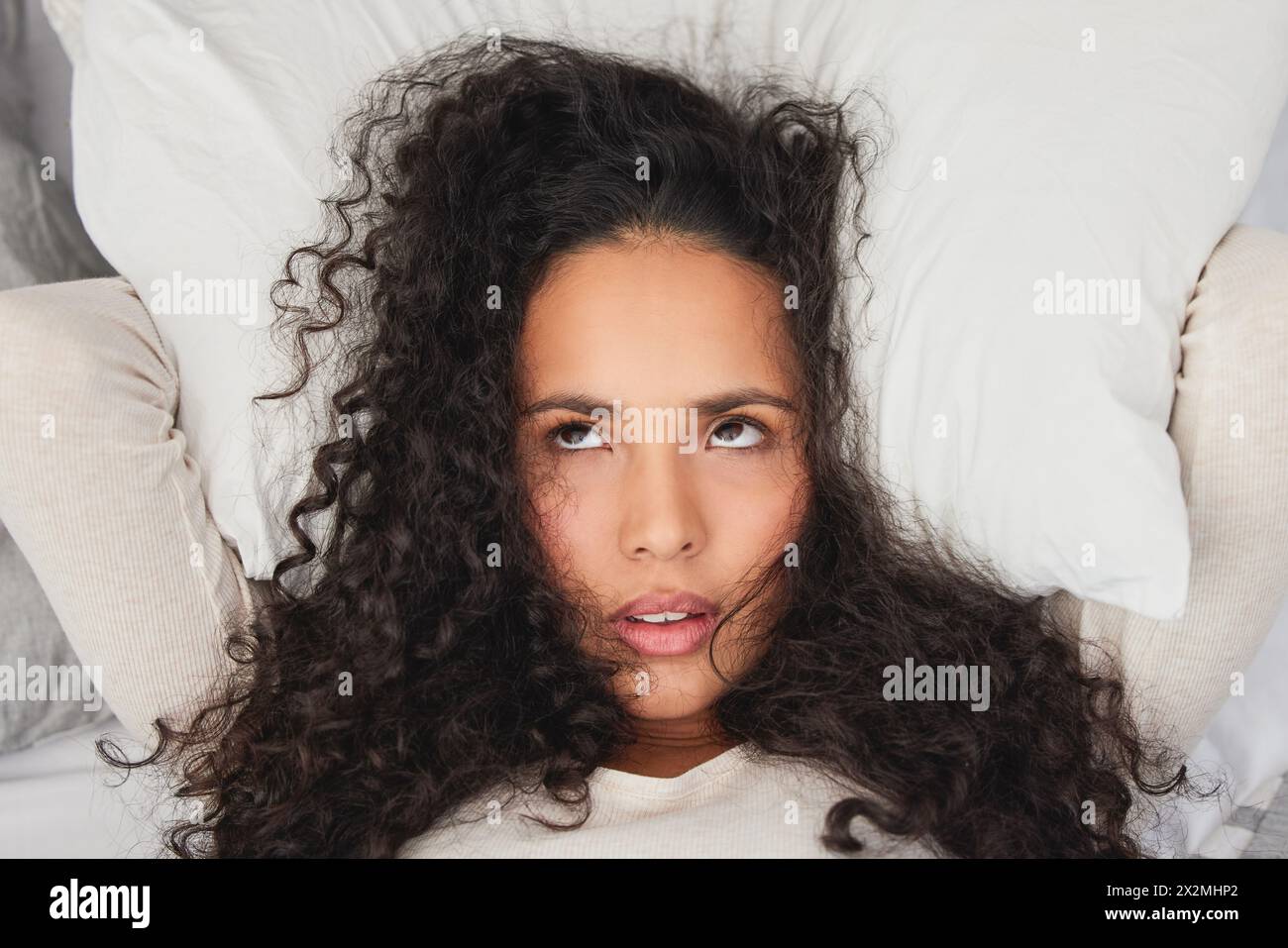 Woman, frustrated in bed from insomnia in morning with sleep trouble ...