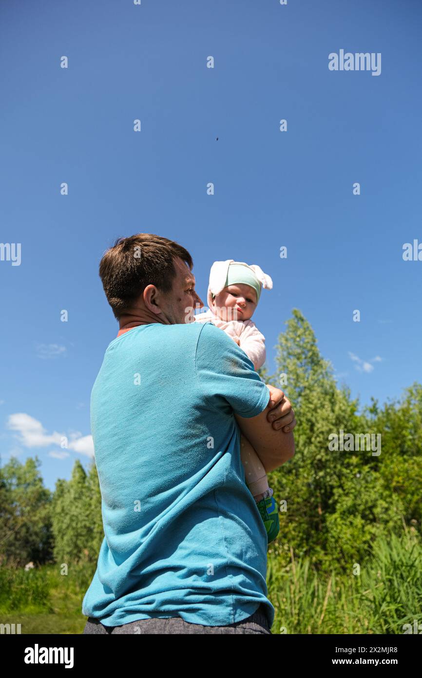 Father throwing up baby hi-res stock photography and images - Alamy