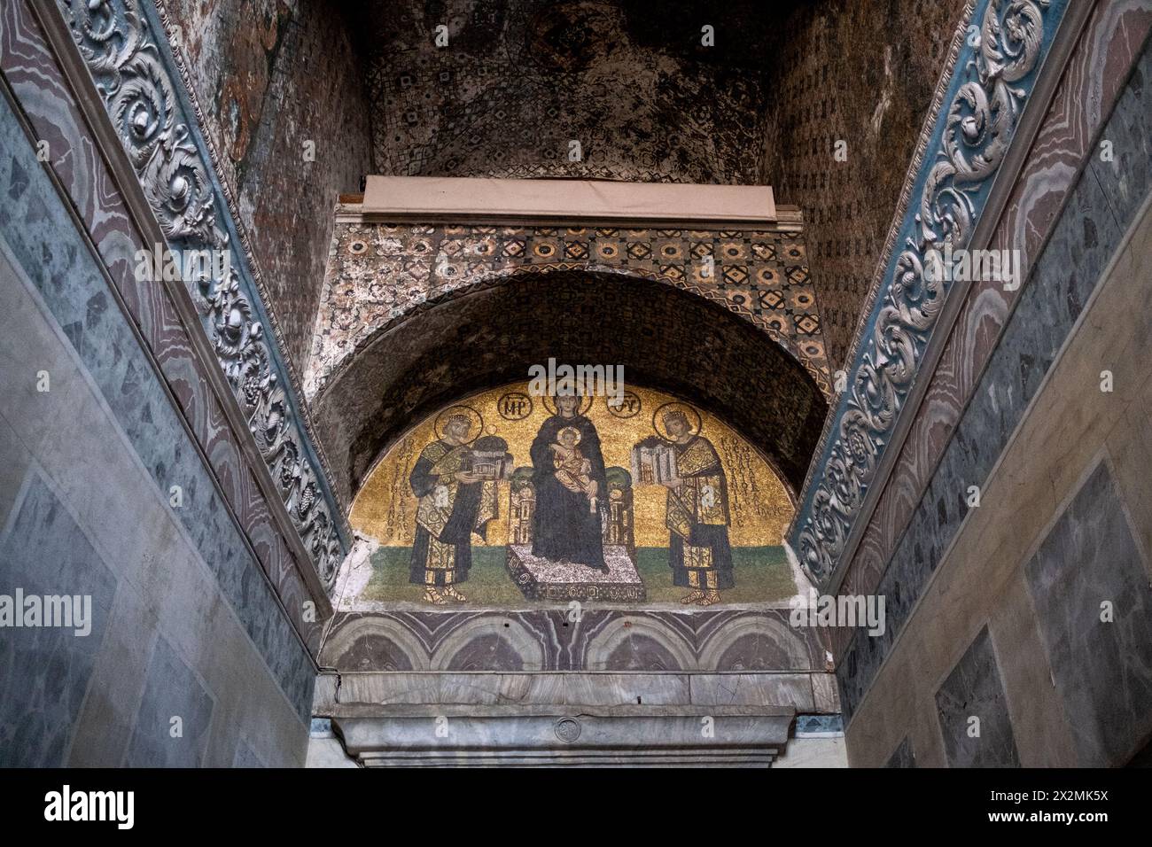 A golden Orthodox Christian icon depicting the Virgin Mary with her ...