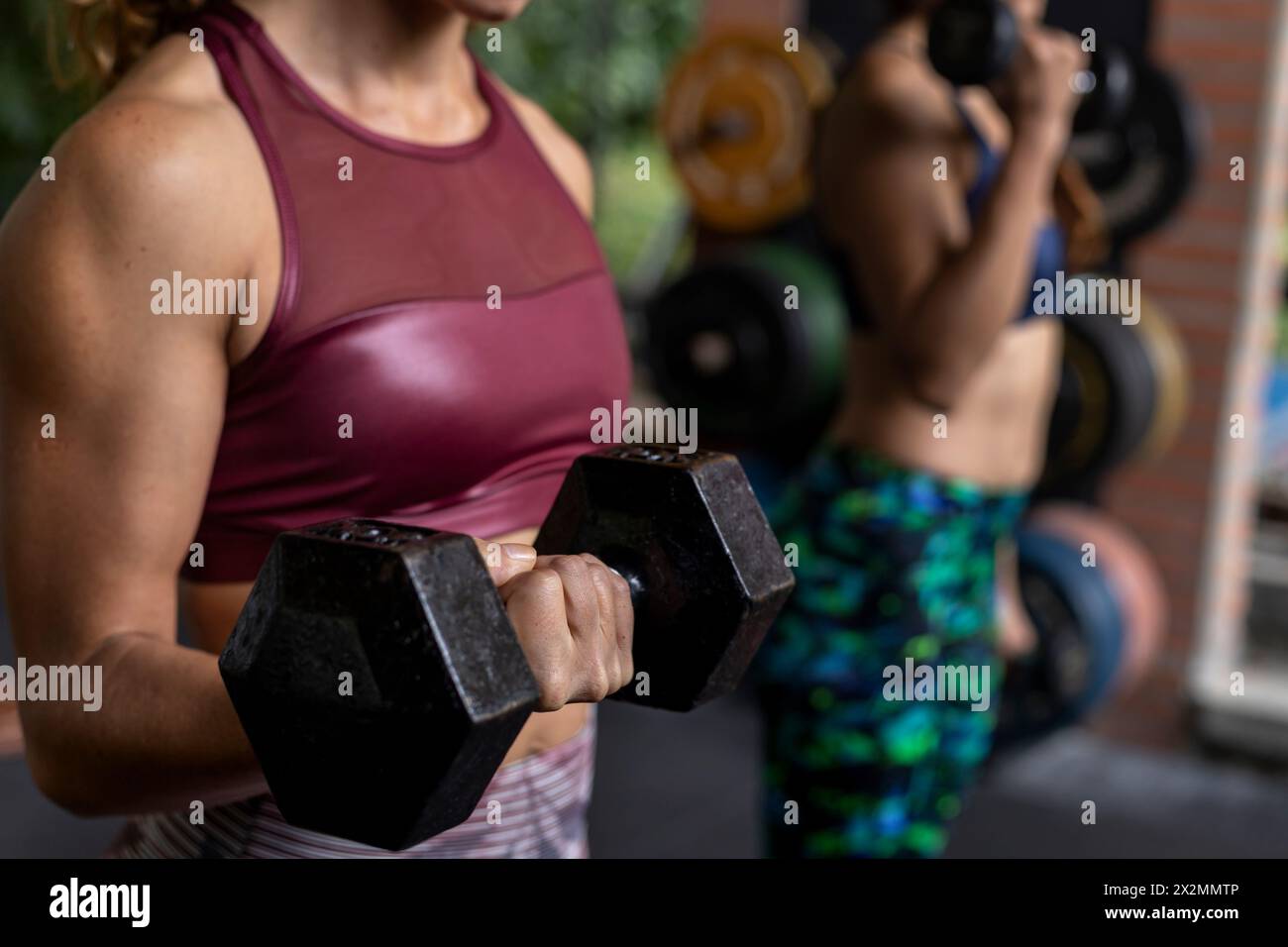 Two unrecognizable Latin American women perform high-intensity ...