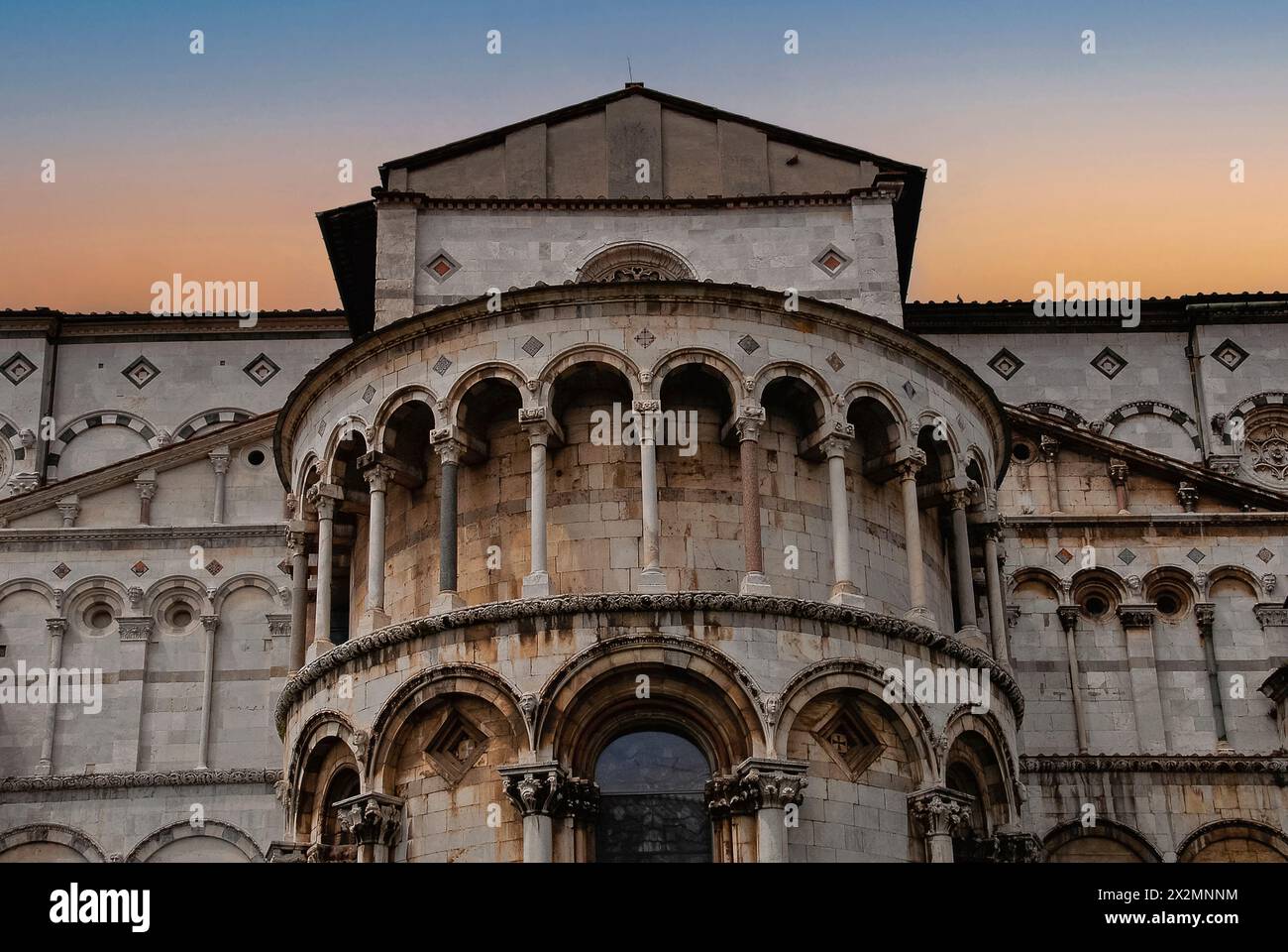 Pisan-Romanesque arcades enhance the apse of the Duomo di San Martino ...