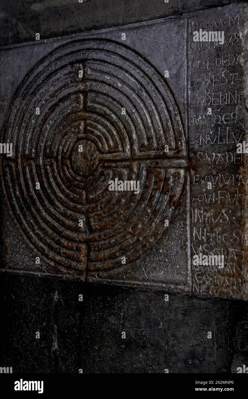 Labyrinth and Latin inscription carved on pillar at entrance to the ...