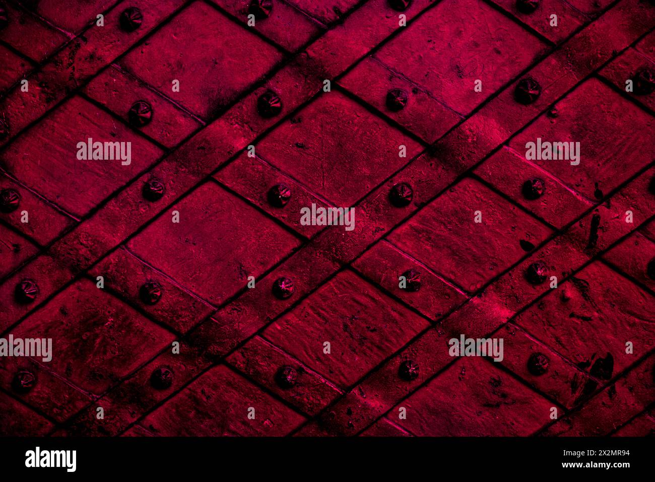 Closeup of red forged metal door for design purpose Stock Photo - Alamy