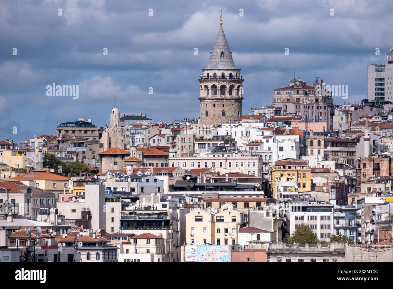 A cityscape of the Pera district with the iconic Galata Tower in ...