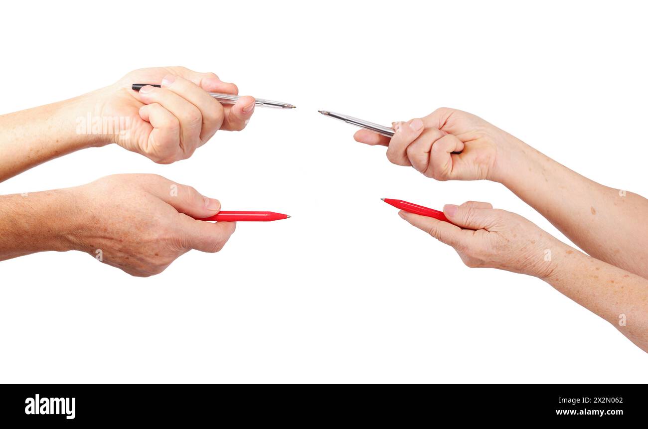 senior hands with pens, isolated Stock Photo - Alamy