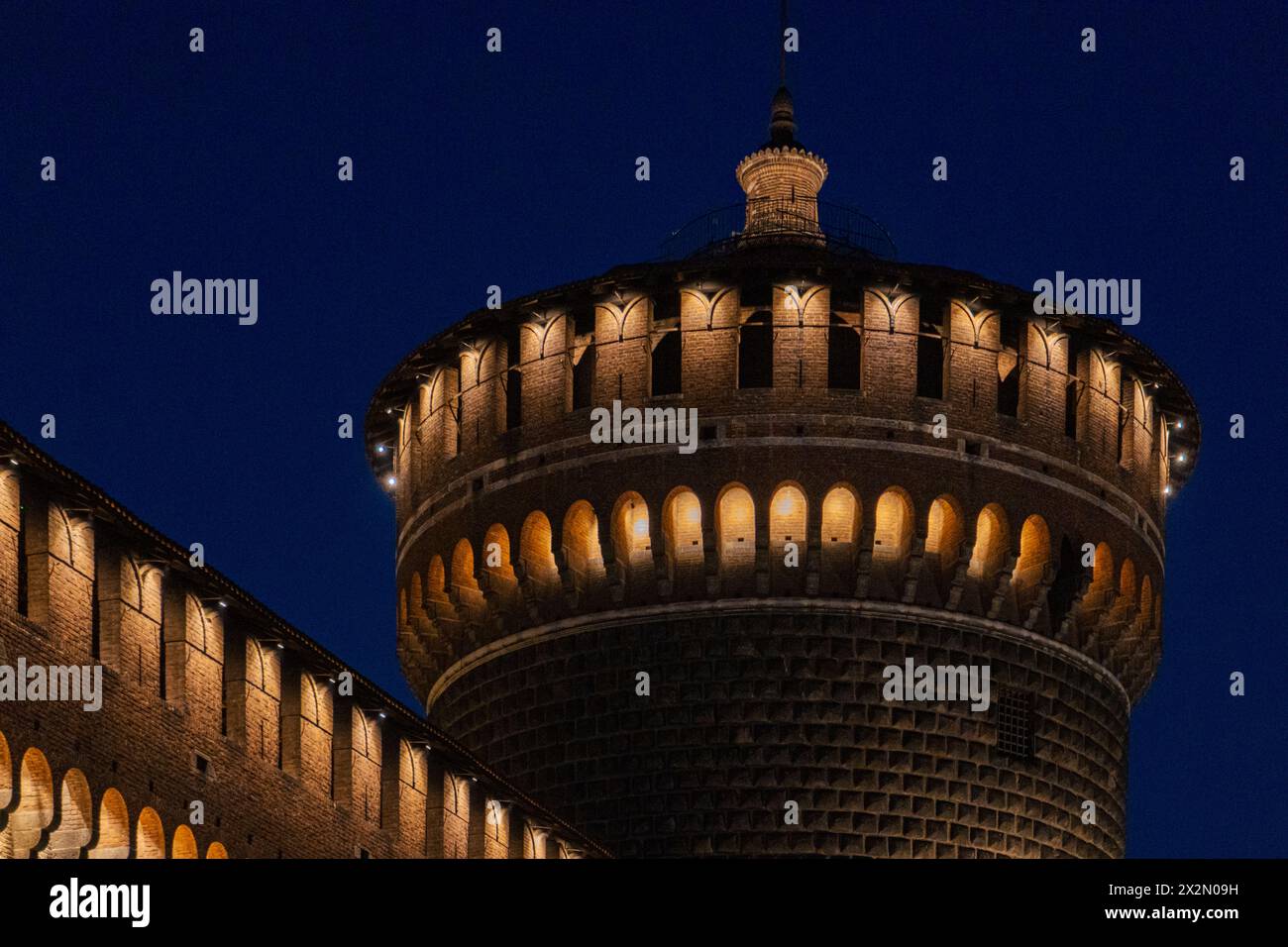 Sforza Castle (Castello Sforzesco) at night in Milano, Italy. The ...