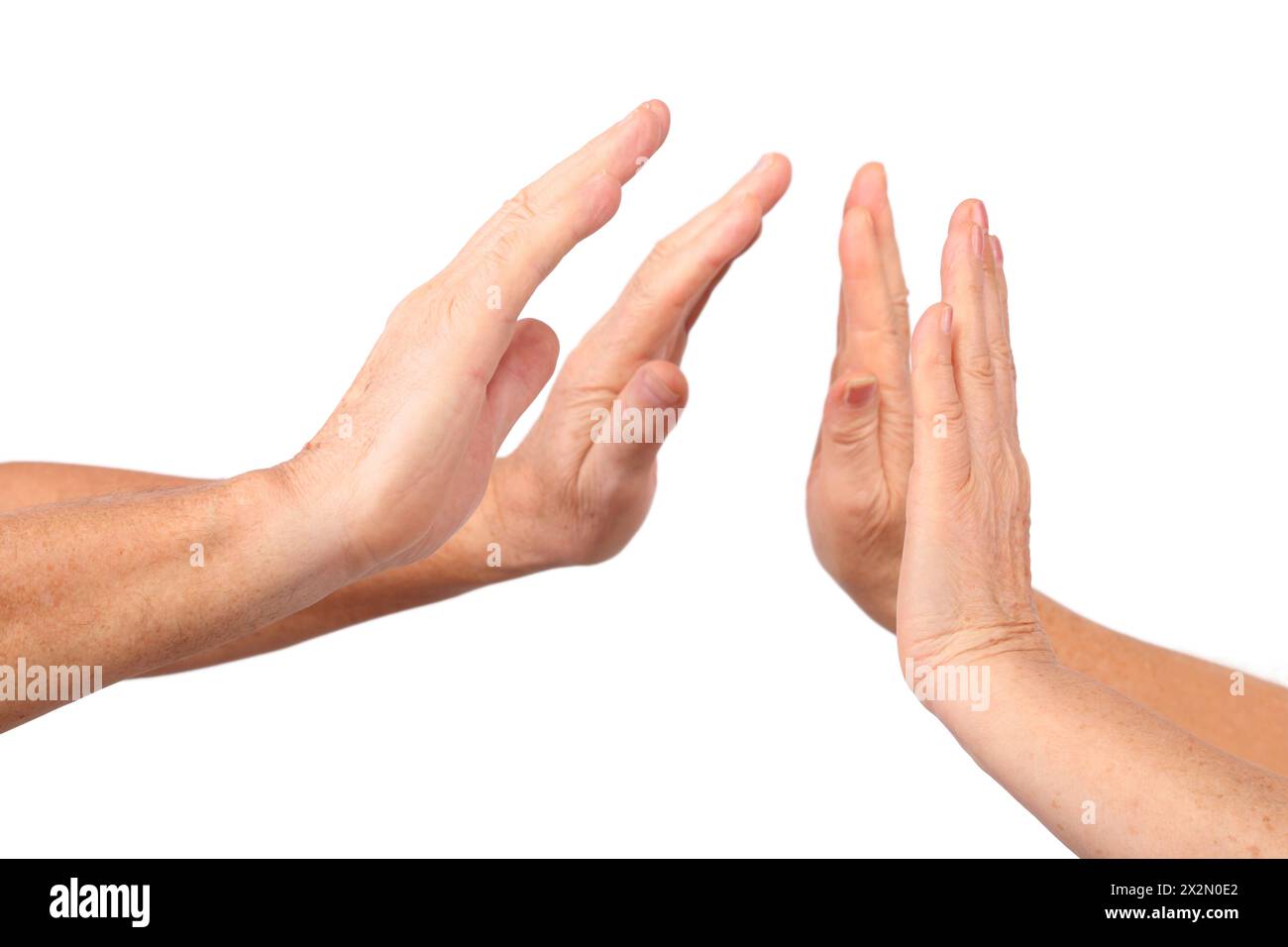senior hands close up to other hands show give five gesture, isolated ...