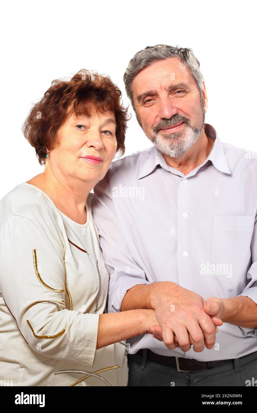 smiling senior couple hold for hands, hug, isolated, half body Stock ...