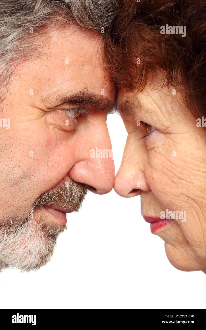senior woman, man face to face, isolated Stock Photo - Alamy
