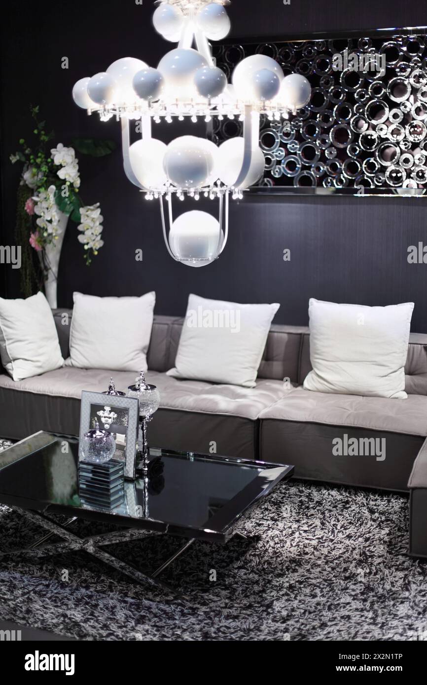 Simple room with sofa, small magazine table in modern style with big ...