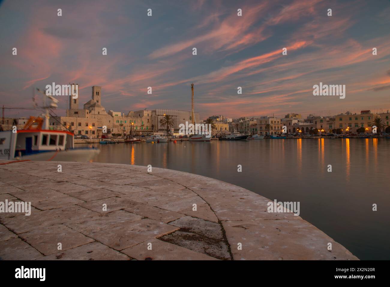 View of the port of Molfetta dominated by a majestic building of the ...