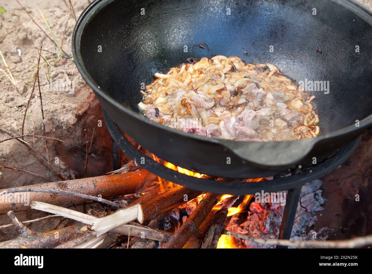 Cooking meat in kettle hi-res stock photography and images - Alamy