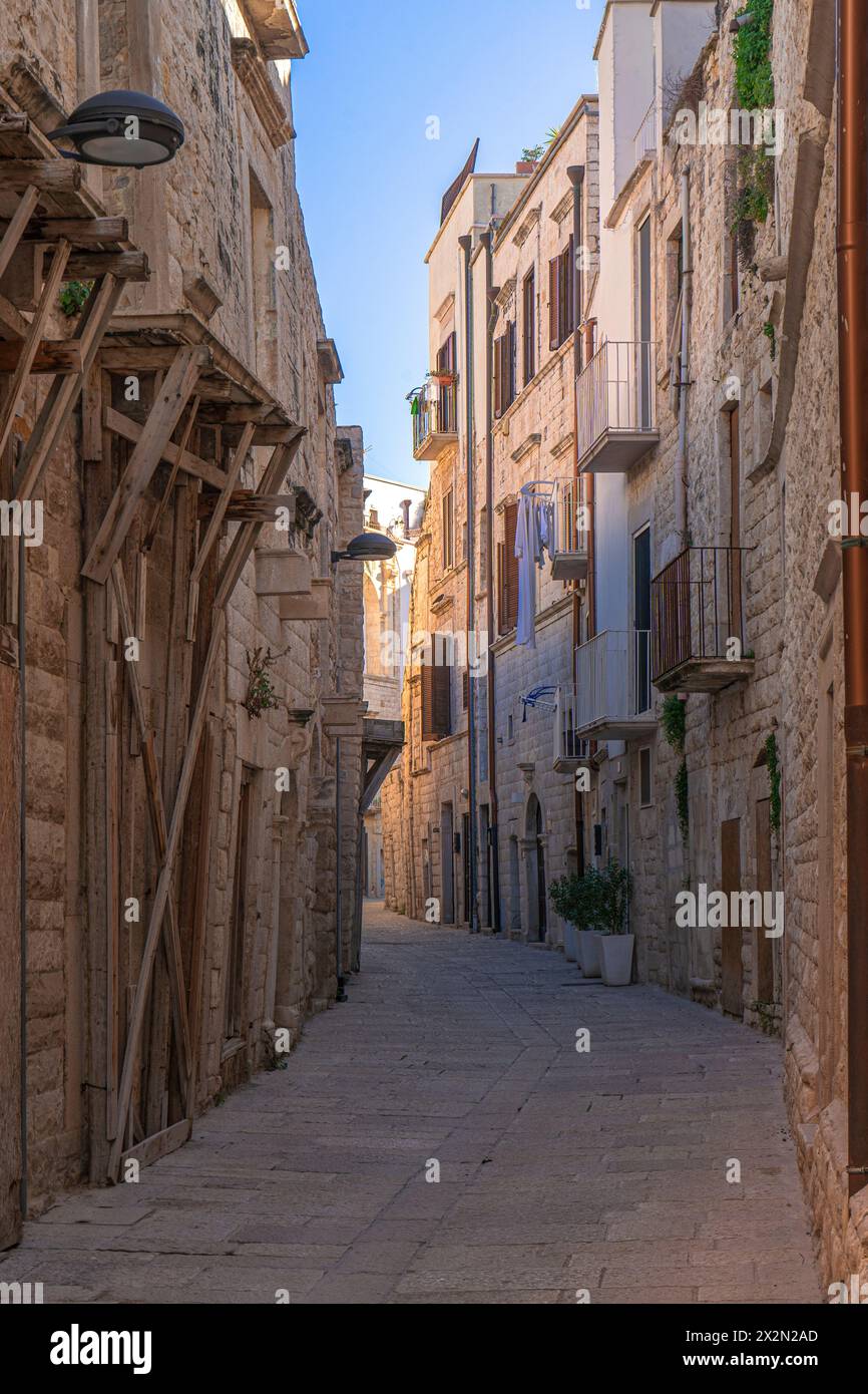 Molfetta old town. Small cobblestone street and stone residential ...