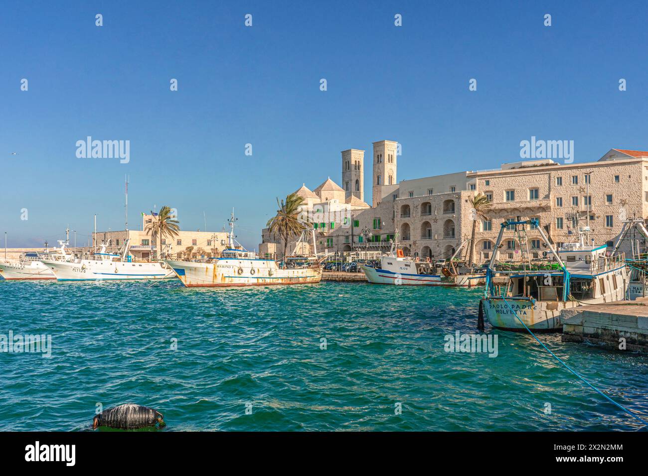 View of the port of Molfetta dominated by a majestic building of the ...