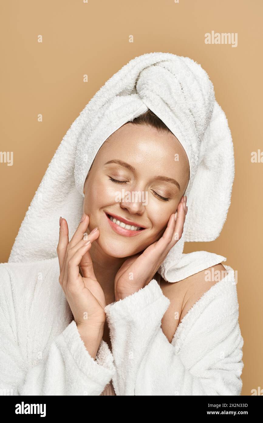 An attractive woman with natural beauty, actively posing with a towel ...