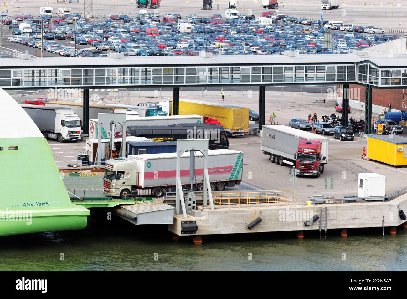 HELSINKI - JULY 20: Loading of trucks onto ferry Star in Helsinki port ...