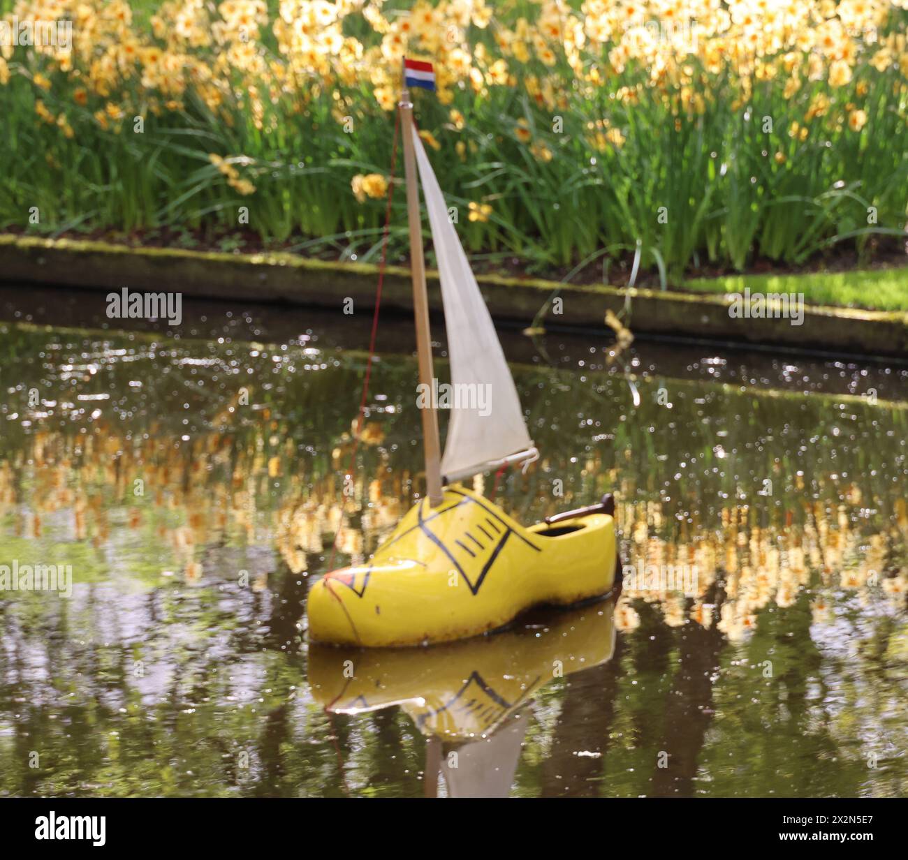 Clogs Boat in water at Keukenhof Tulip Gardens 'BOLLENSTREEK' near ...
