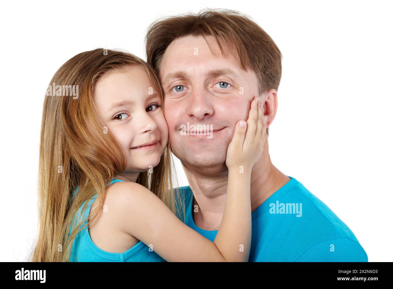 Little girl snuggle her cheek to father cheek Stock Photo - Alamy