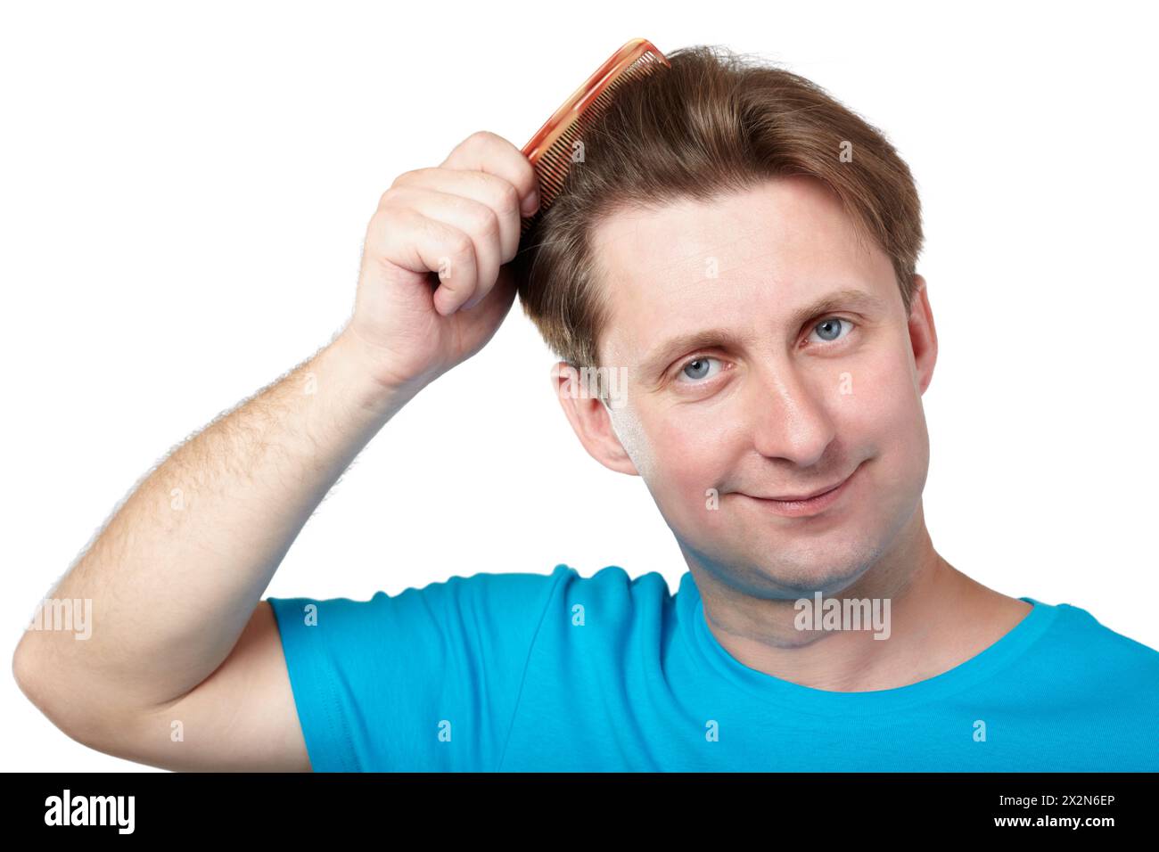 Man combs hair comb hi-res stock photography and images - Alamy