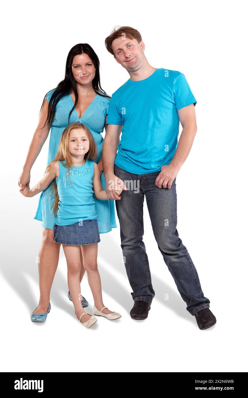 Mother, father and little daughter stand holding hands Stock Photo - Alamy