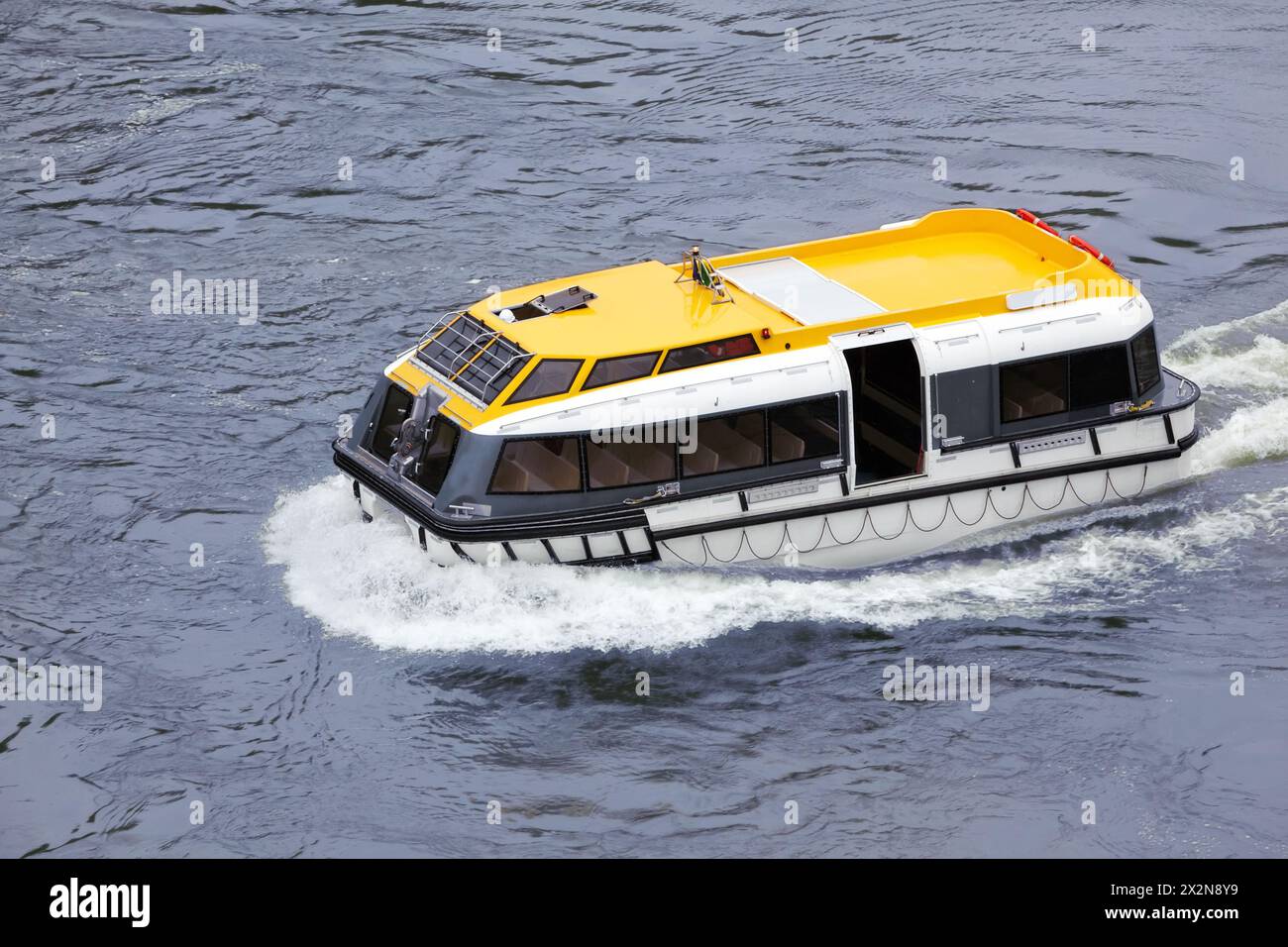 Lifeboat floats on sea Stock Photo - Alamy
