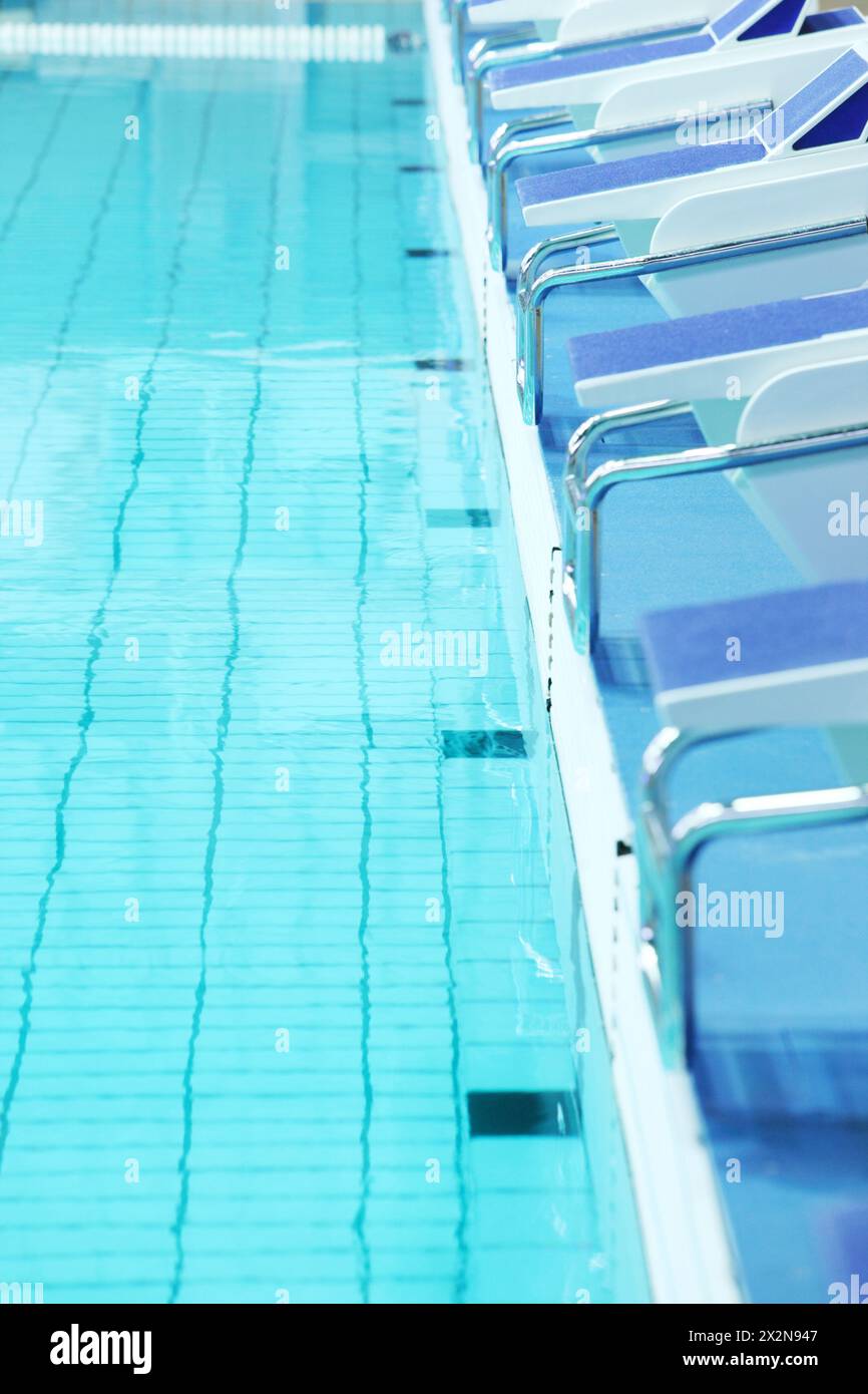 Swimming pool with transparent water and platforms for descent into ...