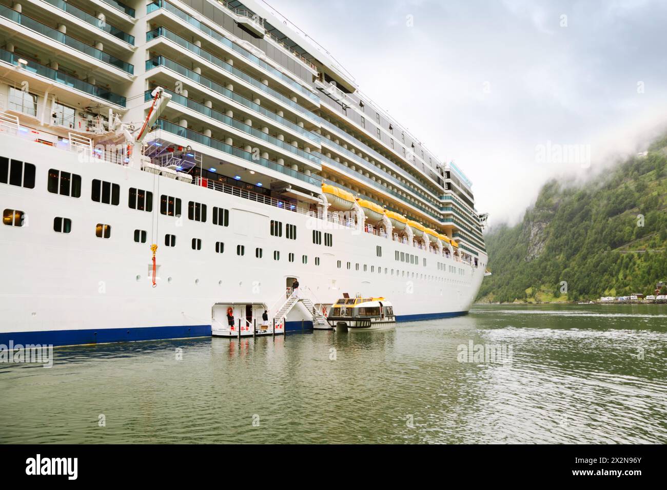 GEIRANGER - JUNE 26: Board of liner Costa Luminosa on JUNE 26, 2011 in ...