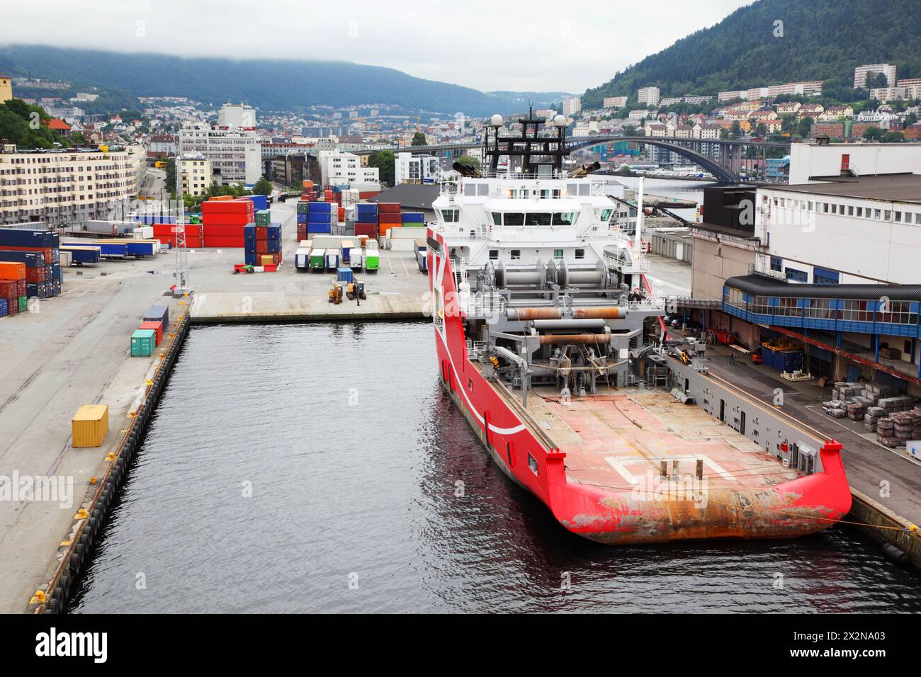 Large cargo ship are in dock in coastal city, many containers stand ...