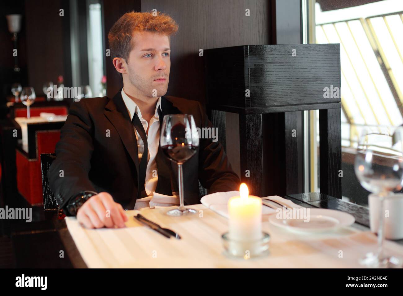 Person eating at the restaurant black and white hi-res stock ...