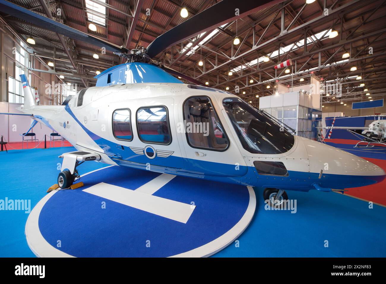 Two helicopters in pavilion on exhibition Stock Photo - Alamy