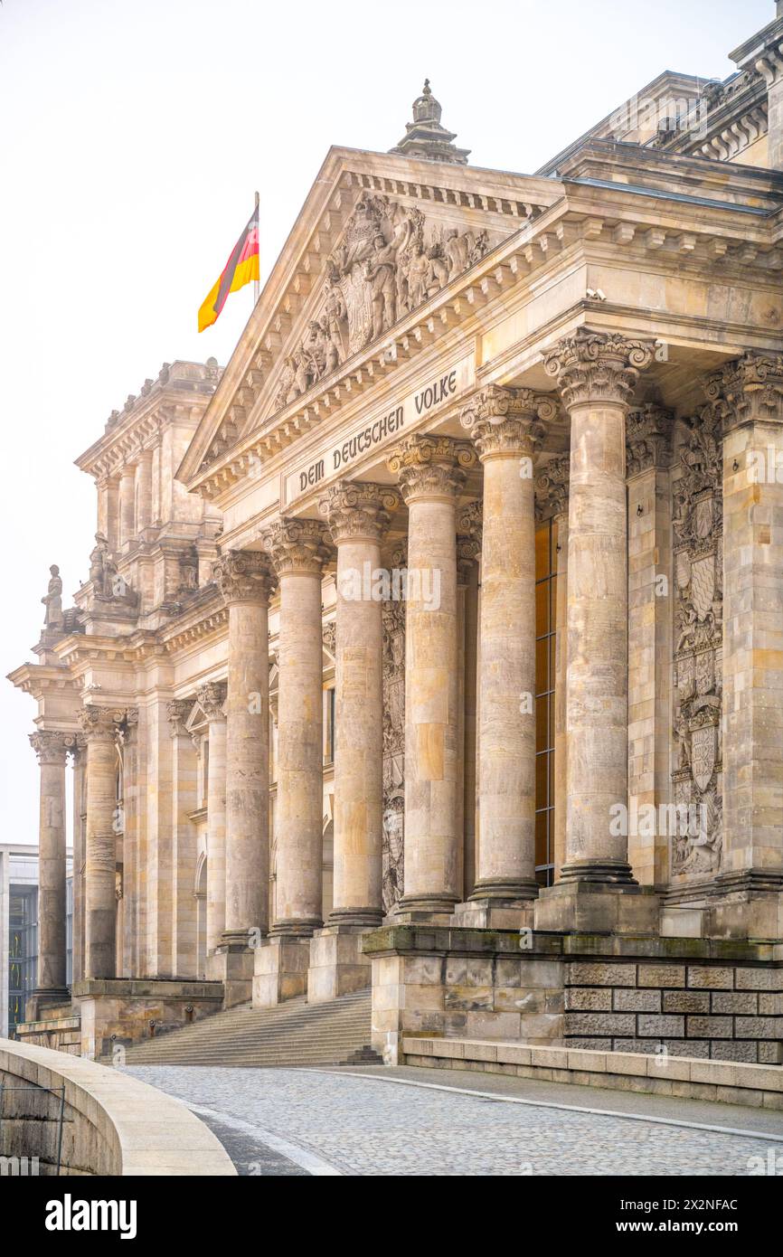 The Reichstag Building in Berlin, adorned with columns and a German ...