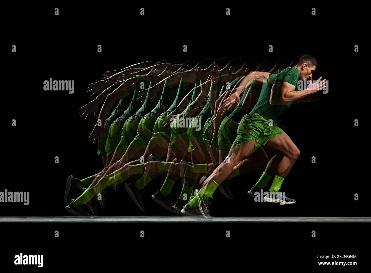 Muscular, athletic man in full motion, training, running against black ...