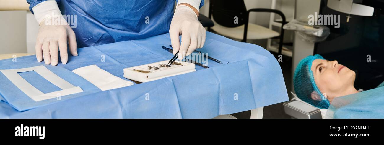 A person rests in a hospital bed, monitored by a machine with medical ...